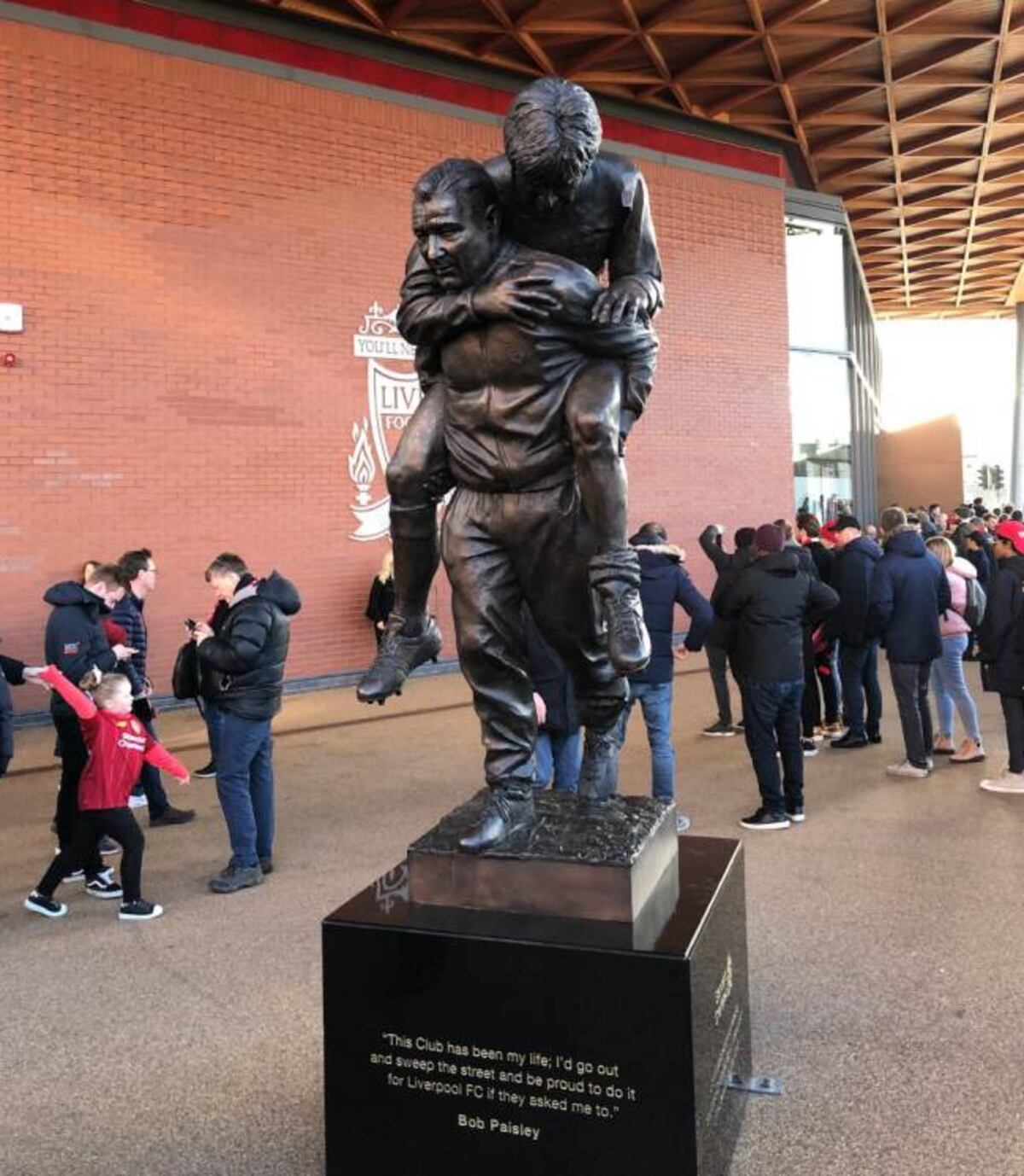Liverpool unveil iconic Paisley-Hughes statue at Anfield - AS USA