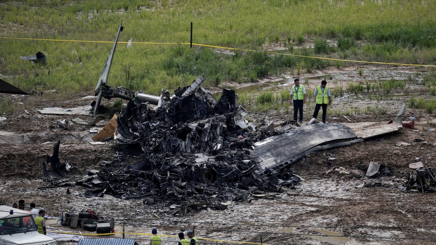 Rescuers gather at site of fatal Nepal plane crash - AS USA Rescuers gather at site of fatal Nepal plane crash - AS USA